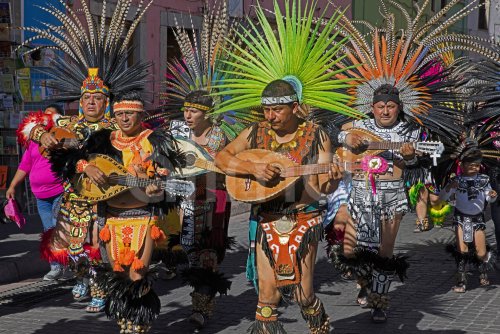 Folkloric Aztec musicians playing the mandolin and dancers performing ...